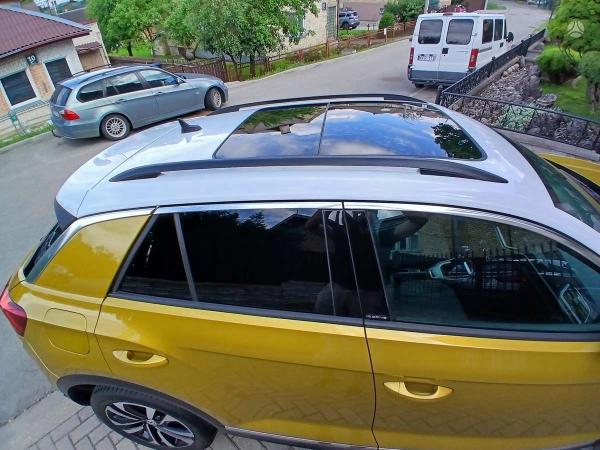 Yellow Volkswagen T-Roc 2020 in Siauliai, with an engine capacity of 1.50 L and mileage of 110 thousand km for 16900 €, photo 7 on AUTOMOTO.COM.LV