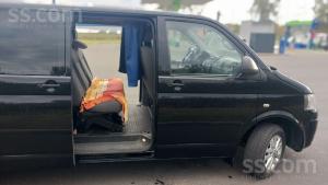 Melns Volkswagen T5 2011 Daugavpils, ar dzinēja tilpumu 2.00 L un nobraukumu 301 tūkst. km par 10600 €, foto 7 vietnē AUTOMOTO.COM.LV