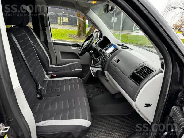 Black Volkswagen T5 2012 in Riga, with an engine capacity of 2.00 L and mileage of 358 thousand km for 10900 €, photo 2 on AUTOMOTO.COM.LV