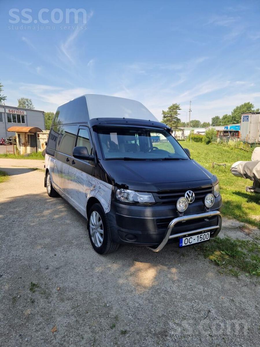 Black Volkswagen T5 2014 in Riga, with an engine capacity of 2.00 L and mileage of 293 thousand km for 12200 €, photo 1 on AUTOMOTO.COM.LV