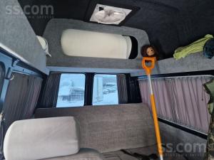 Black Volkswagen T5 2014 in Riga, with an engine capacity of 2.00 L and mileage of 293 thousand km for 12200 €, photo 8 on AUTOMOTO.COM.LV