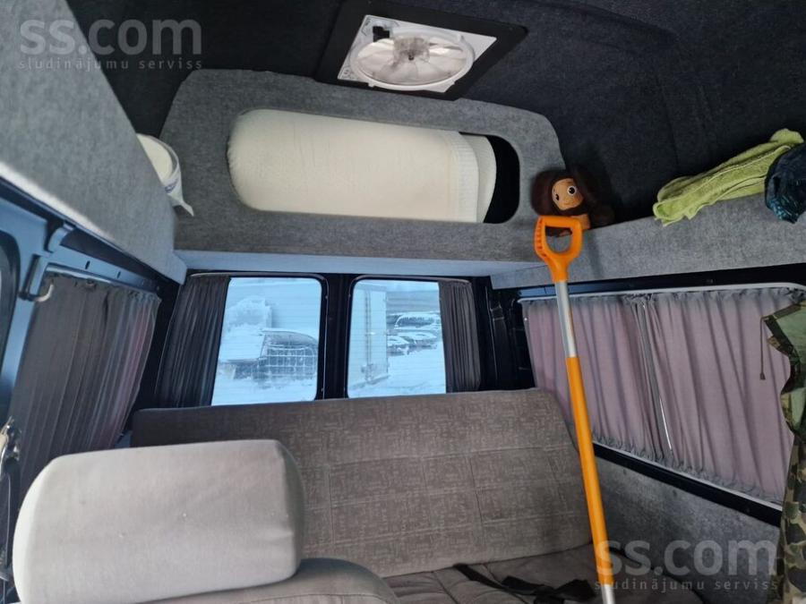 Black Volkswagen T5 2014 in Riga, with an engine capacity of 2.00 L and mileage of 293 thousand km for 12200 €, photo 8 on AUTOMOTO.COM.LV