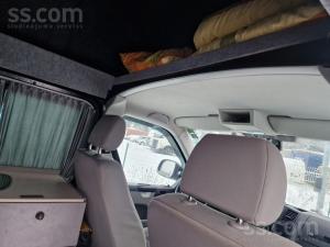 Black Volkswagen T5 2014 in Riga, with an engine capacity of 2.00 L and mileage of 293 thousand km for 12200 €, photo 9 on AUTOMOTO.COM.LV
