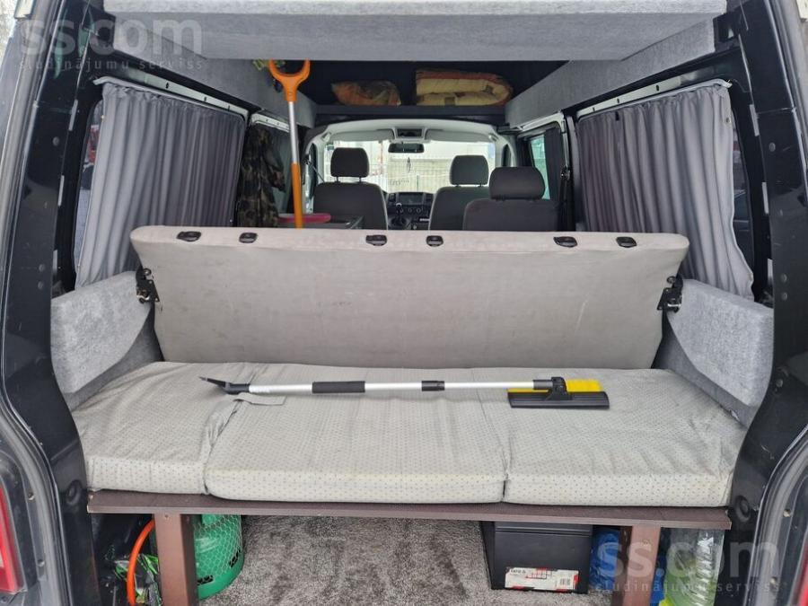 Black Volkswagen T5 2014 in Riga, with an engine capacity of 2.00 L and mileage of 293 thousand km for 12200 €, photo 11 on AUTOMOTO.COM.LV