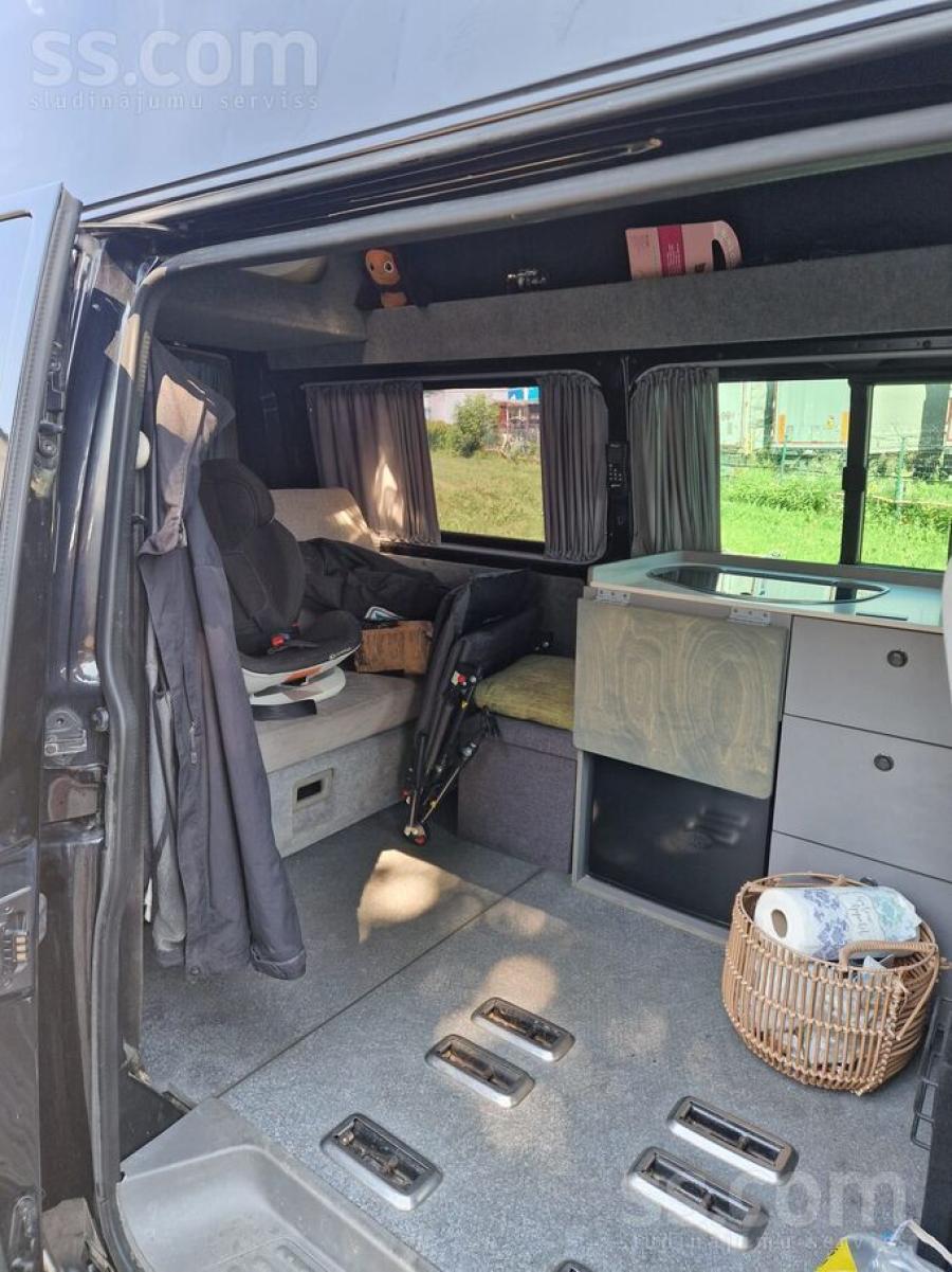 Black Volkswagen T5 2014 in Riga, with an engine capacity of 2.00 L and mileage of 293 thousand km for 12200 €, photo 14 on AUTOMOTO.COM.LV