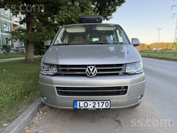 Brown Volkswagen T5 2013 in Riga, with an engine capacity of 2.00 L and mileage of 280 thousand km for 11000 €, photo 5 on AUTOMOTO.COM.LV