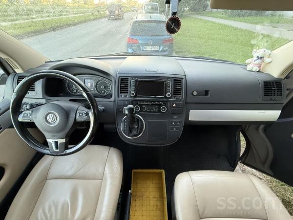 Brown Volkswagen T5 2013 in Riga, with an engine capacity of 2.00 L and mileage of 280 thousand km for 11000 €, photo 10 on AUTOMOTO.COM.LV