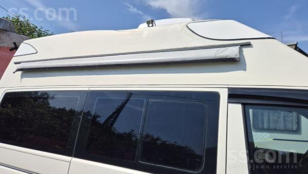 Balts Volkswagen T5 2005 Rīga, ar dzinēja tilpumu 1.90 L un nobraukumu 276 tūkst. km par 6700 €, foto 7 vietnē AUTOMOTO.COM.LV