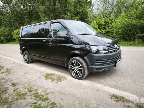 Black Volkswagen T6 2017 in Riga, with an engine capacity of 2.00 L and mileage of 236 thousand km for 11300 €, photo 1 on AUTOMOTO.COM.LV
