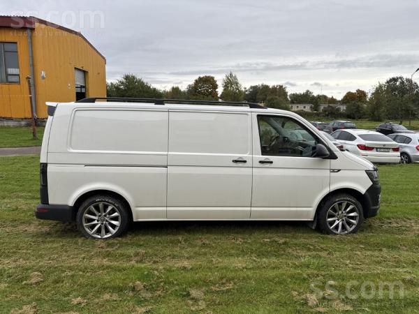 White Volkswagen T6 2019 in Riga, with an engine capacity of 2.00 L and mileage of 276 thousand km for 14500 €, photo 3 on AUTOMOTO.COM.LV