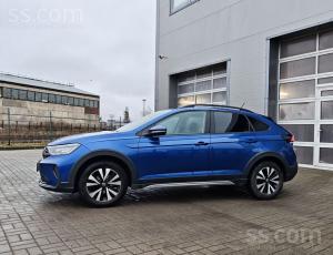 Blue Volkswagen Taigo 2022 in Liepaja, with an engine capacity of 1.00 L and mileage of 71 thousand km for 18900 €, photo 3 on AUTOMOTO.COM.LV