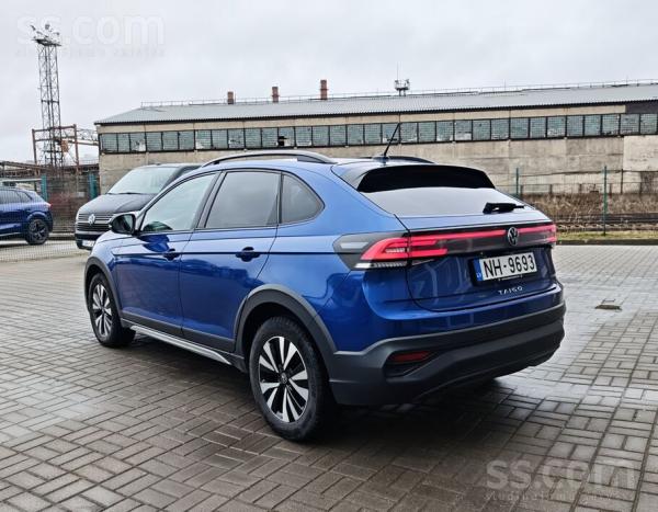 Blue Volkswagen Taigo 2022 in Liepaja, with an engine capacity of 1.00 L and mileage of 71 thousand km for 18900 €, photo 3 on AUTOMOTO.COM.LV