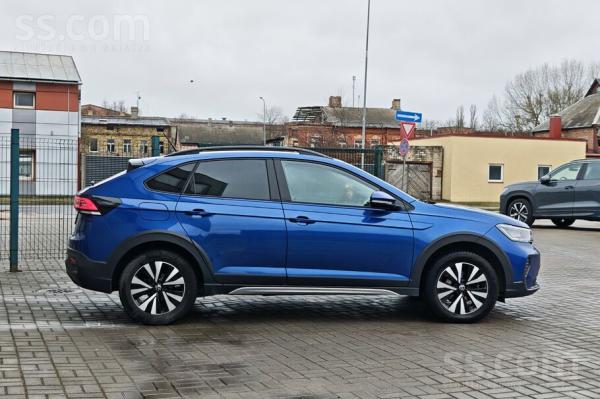 Blue Volkswagen Taigo 2022 in Liepaja, with an engine capacity of 1.00 L and mileage of 71 thousand km for 18900 €, photo 6 on AUTOMOTO.COM.LV