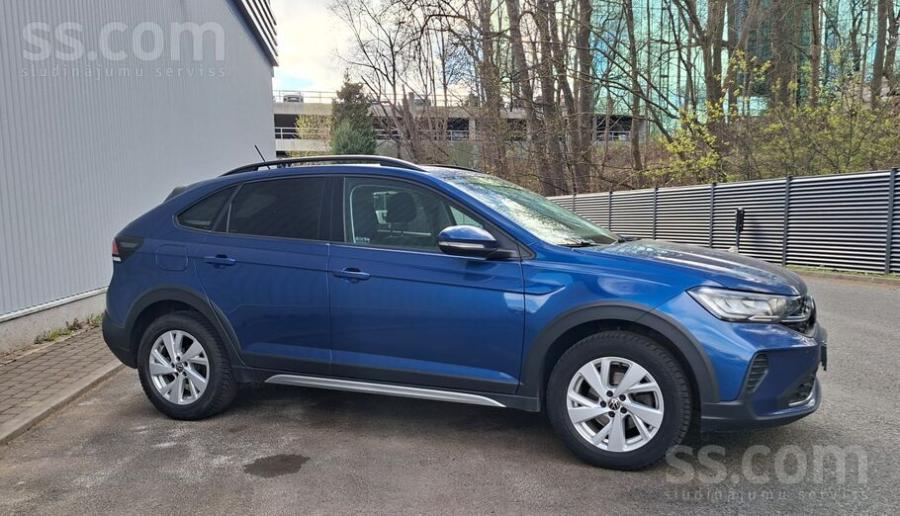 Zils Volkswagen Taigo 2022 Rīga, ar dzinēja tilpumu 1.00 L un nobraukumu 86 tūkst. km par 13800 €, foto 8 vietnē AUTOMOTO.COM.LV