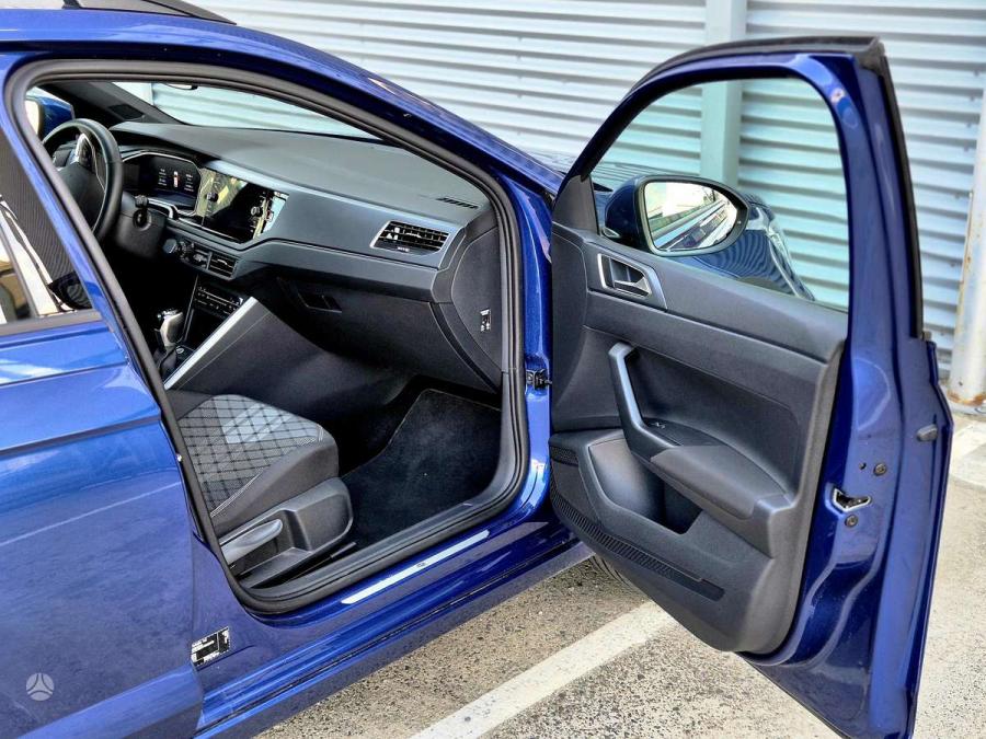 Zils Volkswagen Taigo 2025 Viļņa, ar dzinēja tilpumu 1.50 L un nobraukumu 28 tūkst. km par 21175 €, foto 38 vietnē AUTOMOTO.COM.LV