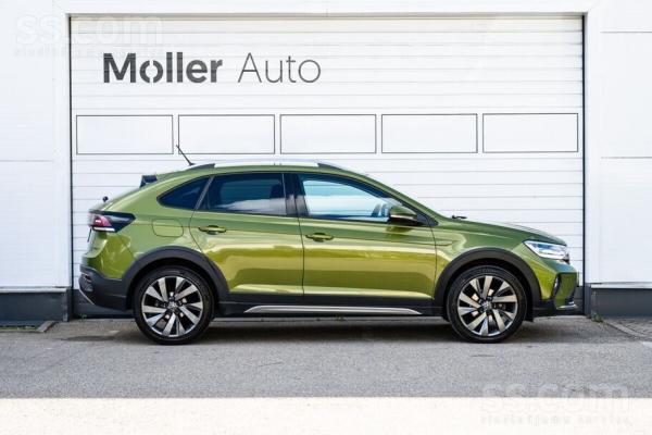 Zaļš Volkswagen Taigo 2022 Rīga, ar dzinēja tilpumu 1.00 L un nobraukumu 71 tūkst. km par 17950 €, foto 6 vietnē AUTOMOTO.COM.LV