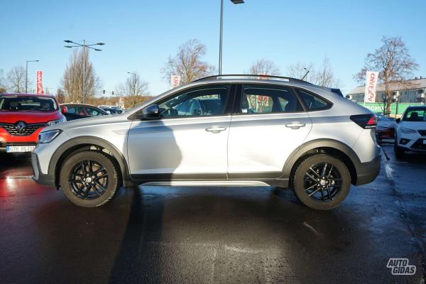 Grey Volkswagen Taigo 2023 in Kaunas, with an engine capacity of 1.00 L and mileage of 42 thousand km for 24347 €, photo 4 on AUTOMOTO.COM.LV