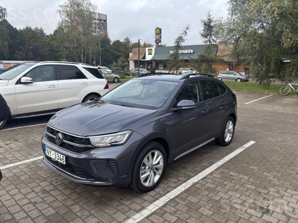 Grey Volkswagen Taigo 2024 in Riga, with an engine capacity of 1.00 L and mileage of 10 thousand km for 22900 €, photo 1 on AUTOMOTO.COM.LV