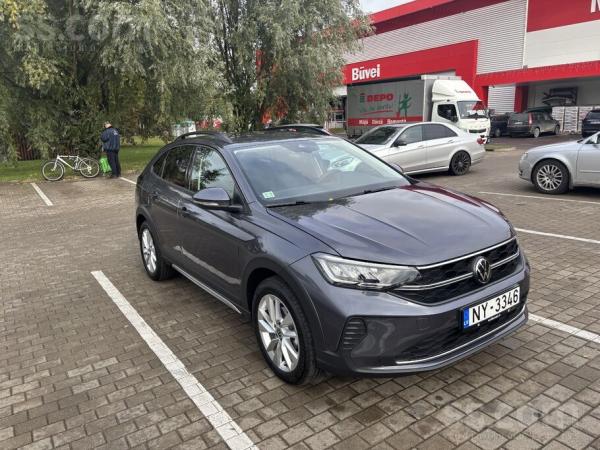 Grey Volkswagen Taigo 2024 in Riga, with an engine capacity of 1.00 L and mileage of 10 thousand km for 22900 €, photo 3 on AUTOMOTO.COM.LV