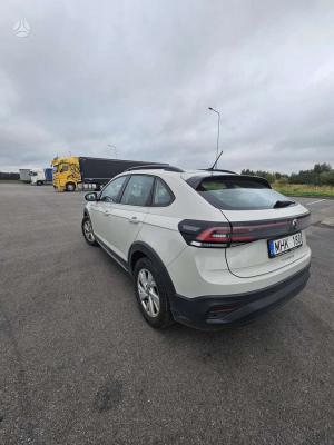 Grey Volkswagen Taigo 2022 in Kaunas, with an engine capacity of 1.00 L and mileage of 231 thousand km for 13100 €, photo 7 on AUTOMOTO.COM.LV