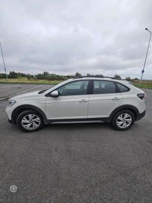 Grey Volkswagen Taigo 2022 in Kaunas, with an engine capacity of 1.00 L and mileage of 231 thousand km for 13100 €, photo 9 on AUTOMOTO.COM.LV