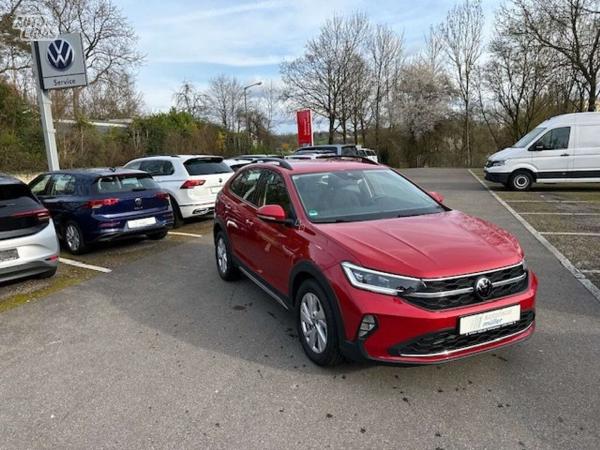 Red Volkswagen Taigo 2023 in Kaunas, with an engine capacity of 1.50 L and mileage of 11 thousand km for 29495 €, photo 1 on AUTOMOTO.COM.LV