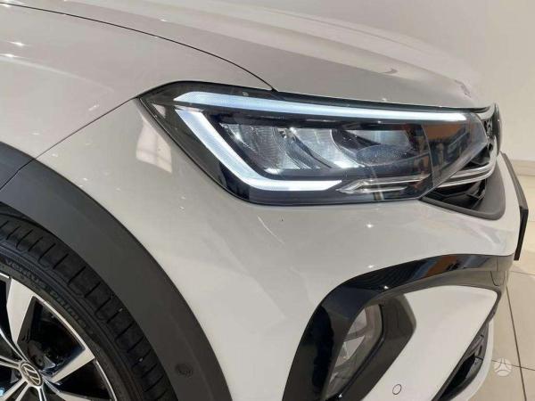 Volkswagen Taigo 2022 Viļņa vietnē Balts Volkswagen Taigo 2022 Viļņa, ar dzinēja tilpumu 1.00 L un nobraukumu 72 tūkst. km par 19900 €, foto 9 vietnē AUTOMOTO.COM.LV