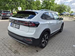 Balts Volkswagen Taigo 2023 Rīga, ar dzinēja tilpumu 1.00 L un nobraukumu 64 tūkst. km par 17300 €, foto 4 vietnē AUTOMOTO.COM.LV