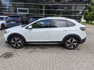 Balts Volkswagen Taigo 2023 Rīga, ar dzinēja tilpumu 1.00 L un nobraukumu 64 tūkst. km par 17300 €, foto 6 vietnē AUTOMOTO.COM.LV
