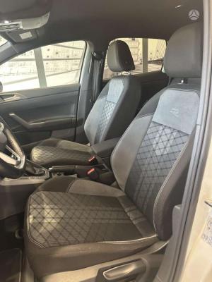White Volkswagen Taigo 2023 in Panevezys, with an engine capacity of 1.50 L and mileage of 27 thousand km for 21900 €, photo 9 on AUTOMOTO.COM.LV