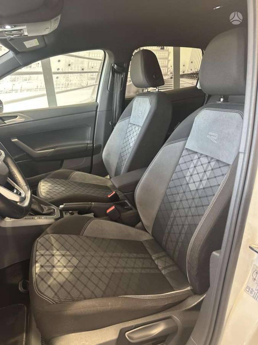 White Volkswagen Taigo 2023 in Panevezys, with an engine capacity of 1.50 L and mileage of 27 thousand km for 21900 €, photo 9 on AUTOMOTO.COM.LV