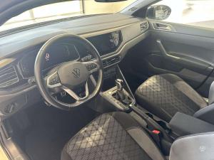 White Volkswagen Taigo 2023 in Panevezys, with an engine capacity of 1.50 L and mileage of 27 thousand km for 21900 €, photo 12 on AUTOMOTO.COM.LV