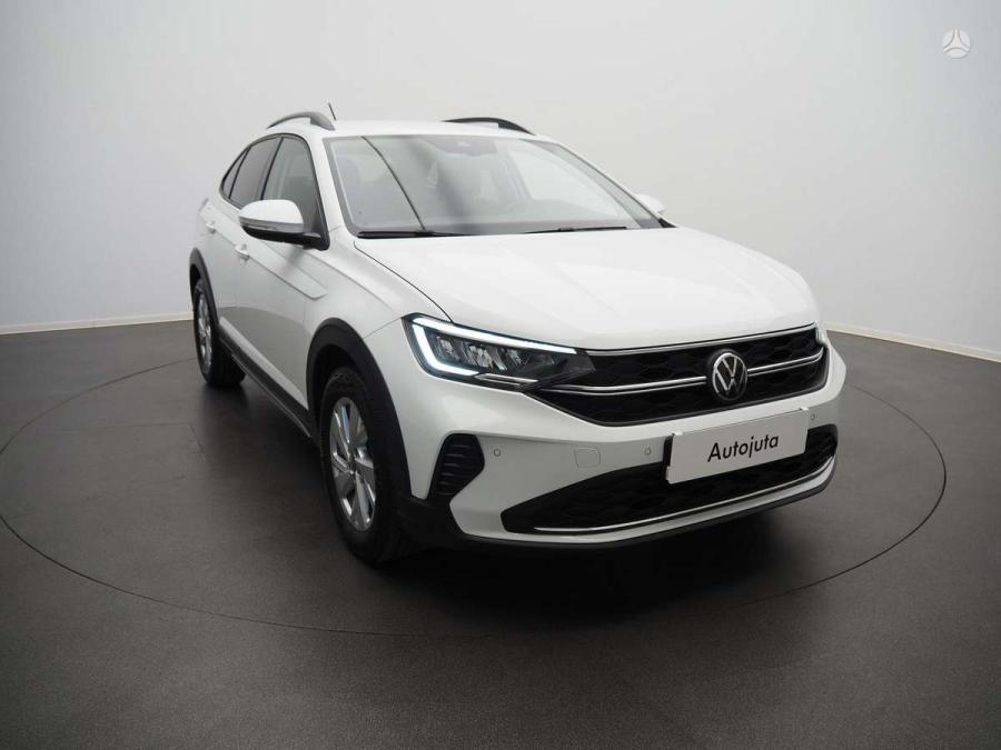 White Volkswagen Taigo 2023 in Vilnius, with an engine capacity of 1.00 L and mileage of 77 thousand km for 16500 €, photo 4 on AUTOMOTO.COM.LV