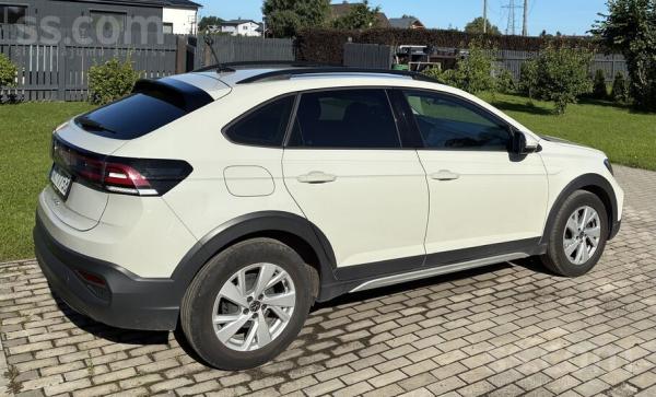 White Volkswagen Taigo 2023 in Riga, with an engine capacity of 1.00 L and mileage of 78 thousand km for 16700 €, photo 1 on AUTOMOTO.COM.LV