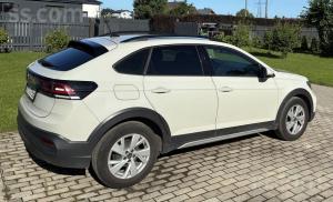 Volkswagen Taigo 2023 Rīga vietnē Balts Volkswagen Taigo 2023 Rīga, ar dzinēja tilpumu 1.00 L un nobraukumu 78 tūkst. km par 16700 €, foto 1 vietnē AUTOMOTO.COM.LV
