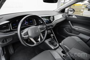 White Volkswagen Taigo 2023 in Riga, with an engine capacity of 1.00 L and mileage of 95 thousand km for 16850 €, photo 22 on AUTOMOTO.COM.LV