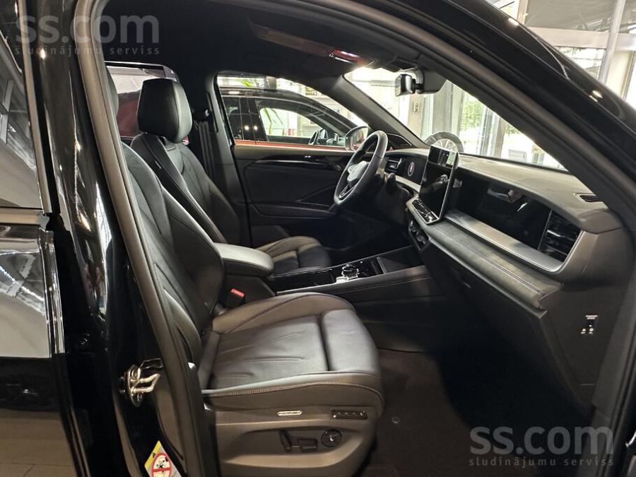 Black Volkswagen Tayron 2026 in Valmiera, with an engine capacity of 2.00 L and mileage of 10 thousand km for 55240 €, photo 11 on AUTOMOTO.COM.LV
