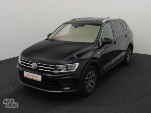 Black Volkswagen Tiguan Allspace 2021 in Vilnius, with an engine capacity of 2.00 L and mileage of 191 thousand km for 19499 €, photo  on AUTOMOTO.COM.LV