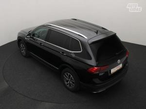 Black Volkswagen Tiguan Allspace 2021 in Vilnius, with an engine capacity of 2.00 L and mileage of 191 thousand km for 19499 €, photo 12 on AUTOMOTO.COM.LV