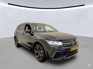 Black Volkswagen Tiguan Allspace 2022 in Siauliai, with an engine capacity of 1.50 L and mileage of 188 thousand km for 26990 €, photo  on AUTOMOTO.COM.LV