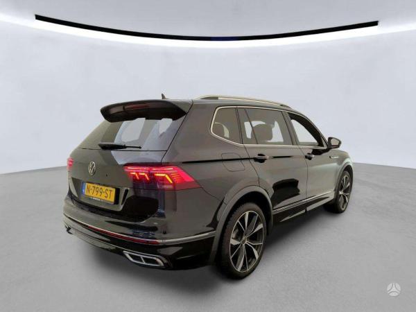 Black Volkswagen Tiguan Allspace 2022 in Siauliai, with an engine capacity of 1.50 L and mileage of 188 thousand km for 26990 €, photo 4 on AUTOMOTO.COM.LV