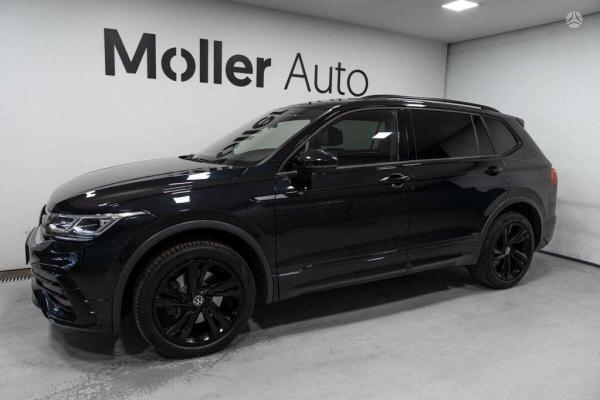 Black Volkswagen Tiguan Allspace 2022 in Vilnius, with an engine capacity of 2.00 L and mileage of 84 thousand km for 28950 €, photo 2 on AUTOMOTO.COM.LV