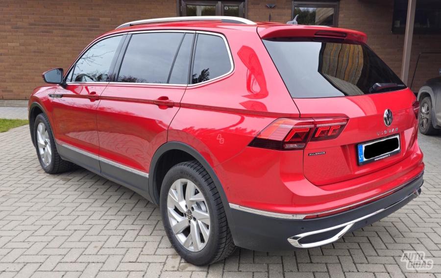 Red Volkswagen Tiguan Allspace 2023 in Vilnius, with an engine capacity of 1.50 L and mileage of 103 thousand km for 26700 €, photo 5 on AUTOMOTO.COM.LV