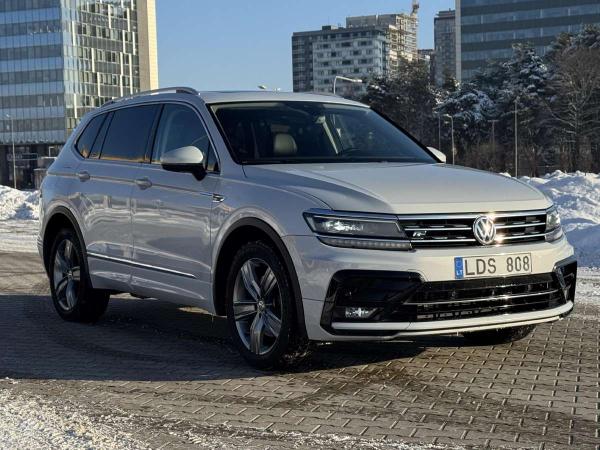 White Volkswagen Tiguan Allspace 2018 in Vilnius, with an engine capacity of 1.98 L and mileage of 178 thousand km for 16900 €, photo 4 on AUTOMOTO.COM.LV