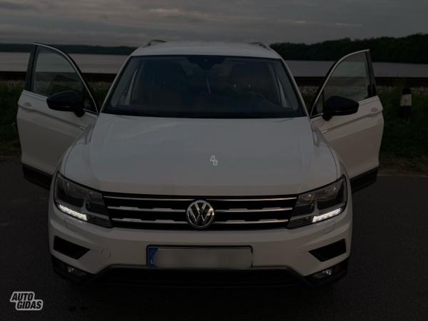 White Volkswagen Tiguan Allspace 2019 in Kaunas, with an engine capacity of 2.00 L and mileage of 282 thousand km for 14900 €, photo 1 on AUTOMOTO.COM.LV
