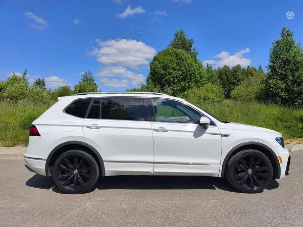 White Volkswagen Tiguan Allspace 2019 in Vilnius, with an engine capacity of 2.00 L and mileage of 167 thousand km for 18900 €, photo 6 on AUTOMOTO.COM.LV
