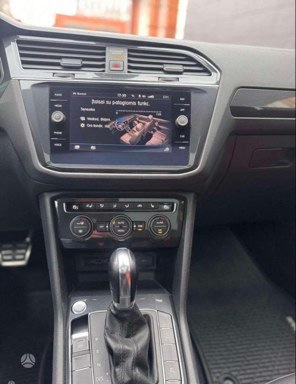 White Volkswagen Tiguan Allspace 2019 in Vilnius, with an engine capacity of 2.00 L and mileage of 167 thousand km for 18900 €, photo 9 on AUTOMOTO.COM.LV