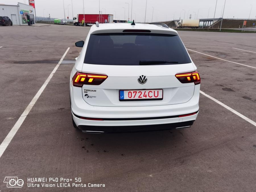 White Volkswagen Tiguan Allspace 2021 in Kaunas, with an engine capacity of 2.00 L and mileage of 144 thousand km for 19500 €, photo 5 on AUTOMOTO.COM.LV