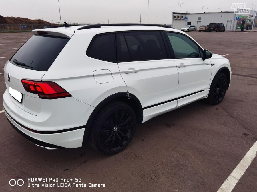 White Volkswagen Tiguan Allspace 2021 in Kaunas, with an engine capacity of 2.00 L and mileage of 147 thousand km for 16000 €, photo 5 on AUTOMOTO.COM.LV
