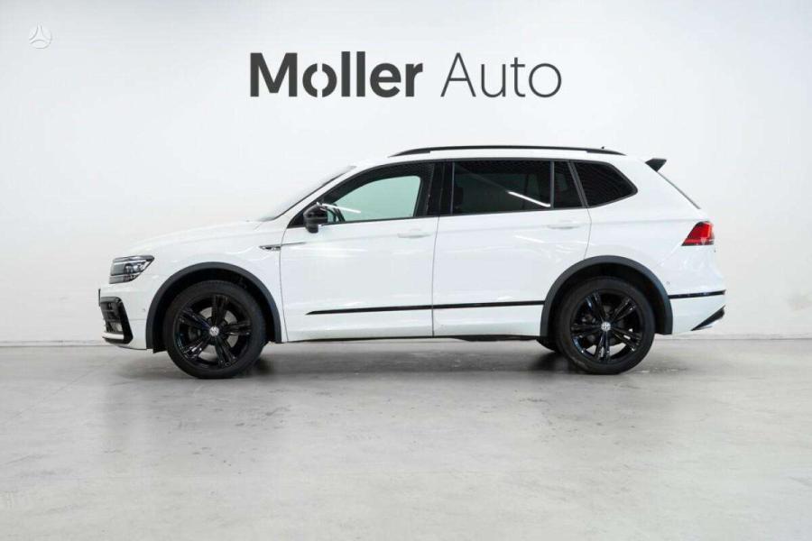 White Volkswagen Tiguan Allspace 2021 in Vilnius, with an engine capacity of 2.00 L and mileage of 196 thousand km for 20900 €, photo 3 on AUTOMOTO.COM.LV
